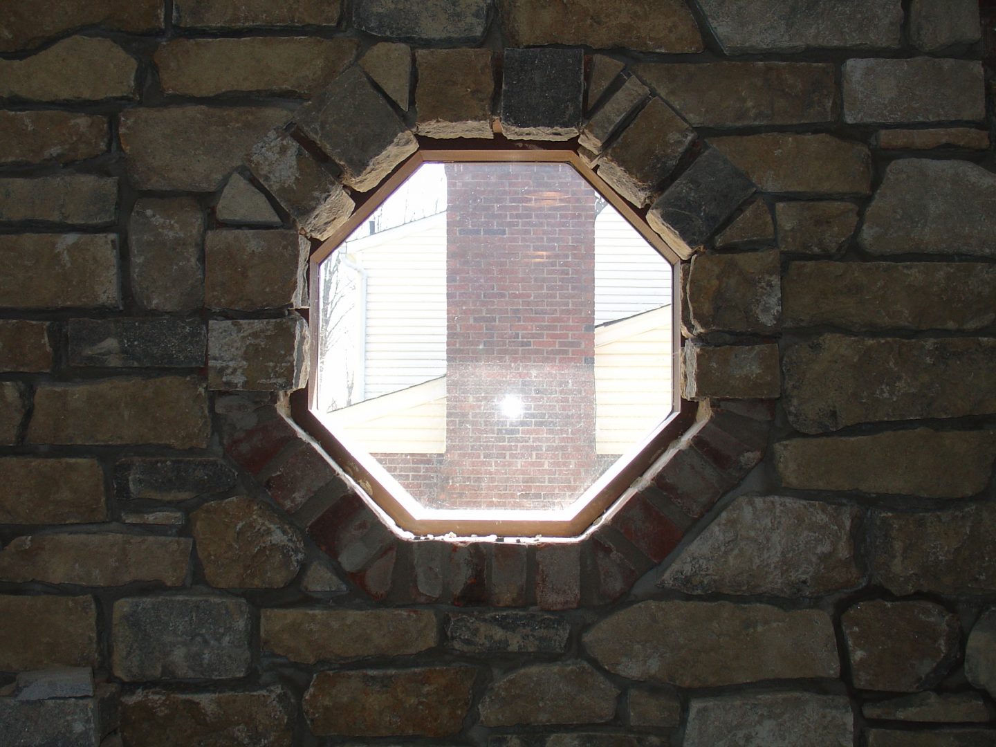 Family room window Stone work partially done DSC02645 | Shawnee Homes